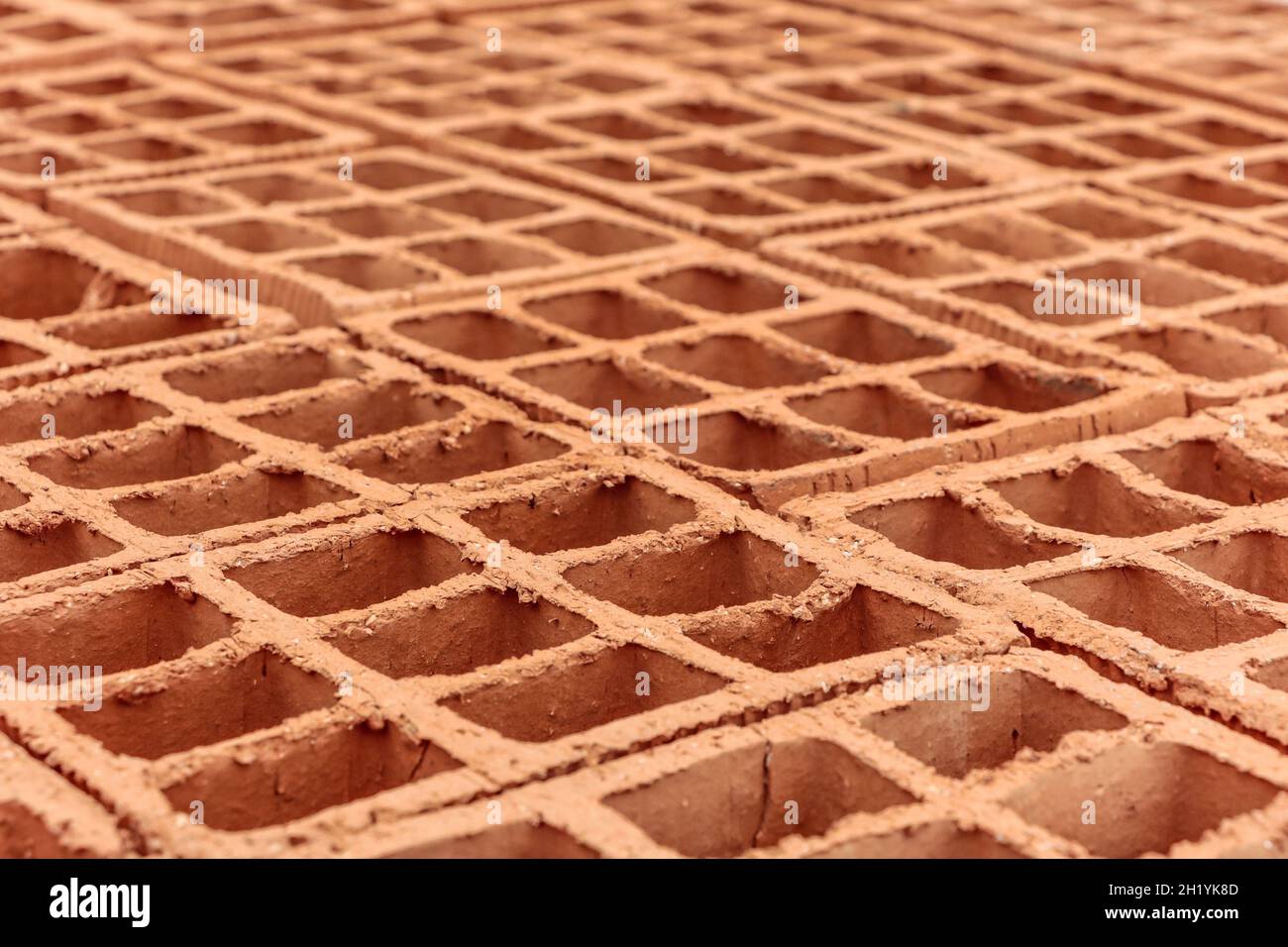 Pile of clay bricks used for building masonry house. The image the ...