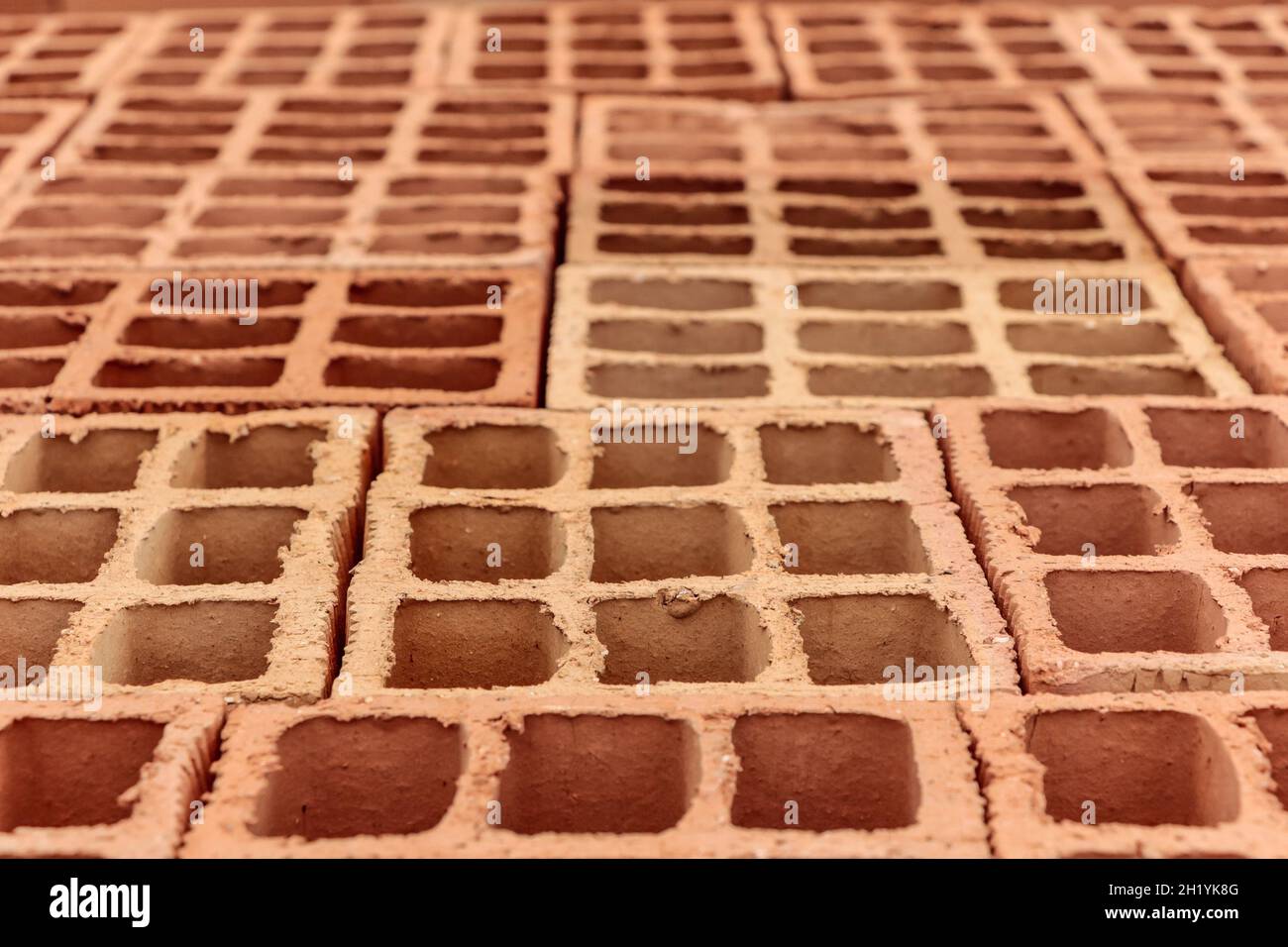 Pile of clay bricks used for building masonry house. The image the ...