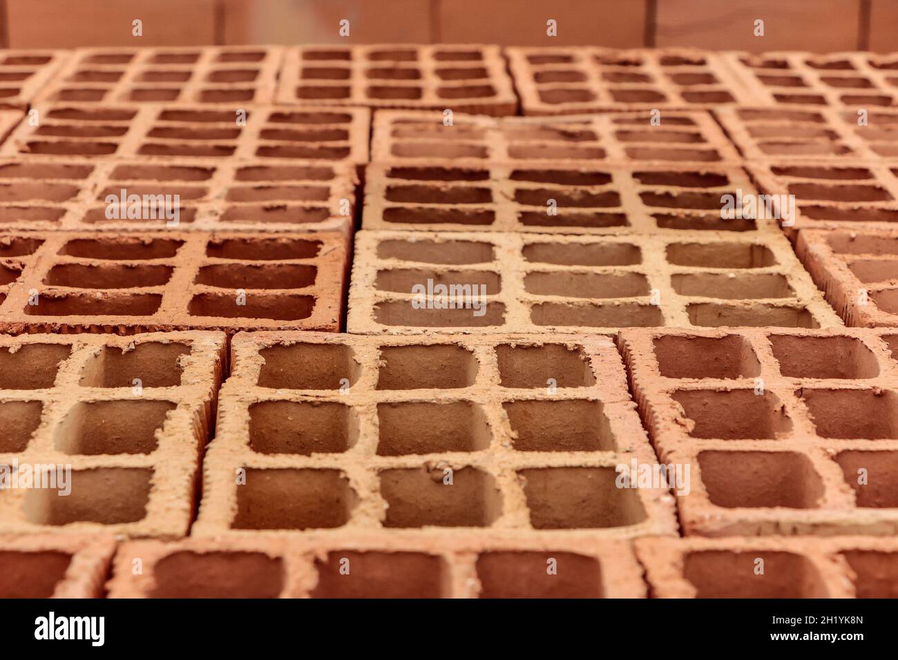 Pile of clay bricks used for building masonry house. The image the ...