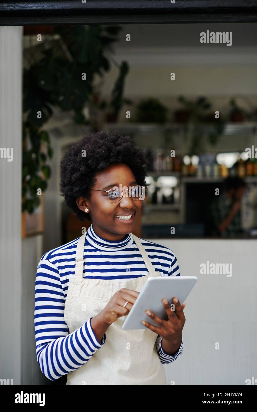 African american business owner tablet hi-res stock photography and ...