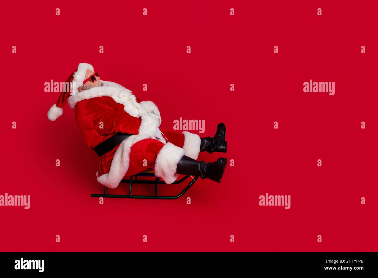 Full size profile photo of funny santa go by sled wear cap glasses coat ...