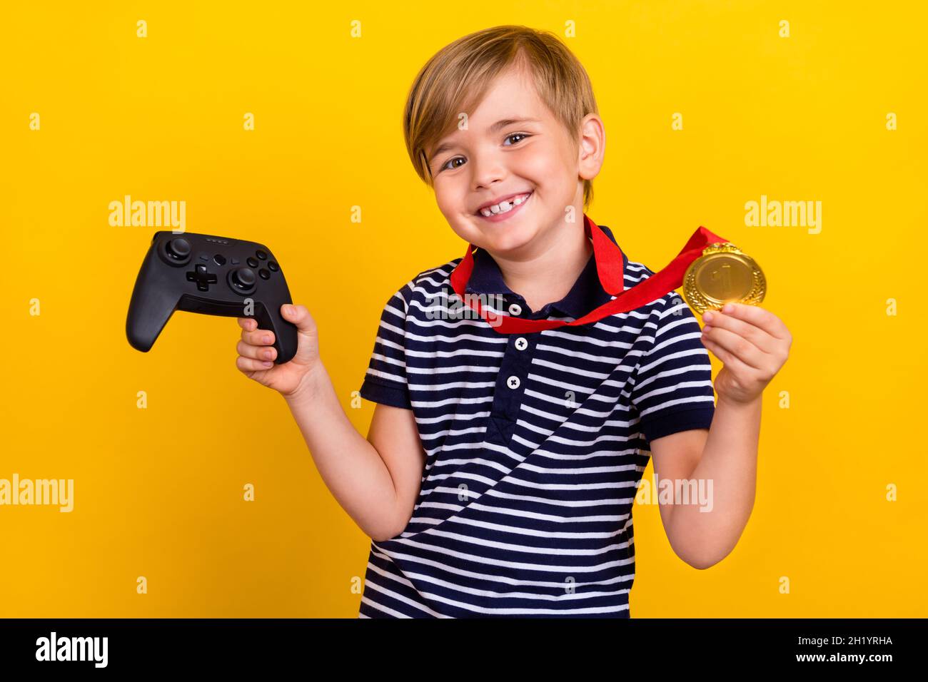 Photo portrait little boy wearing golden medal prize for best video ...