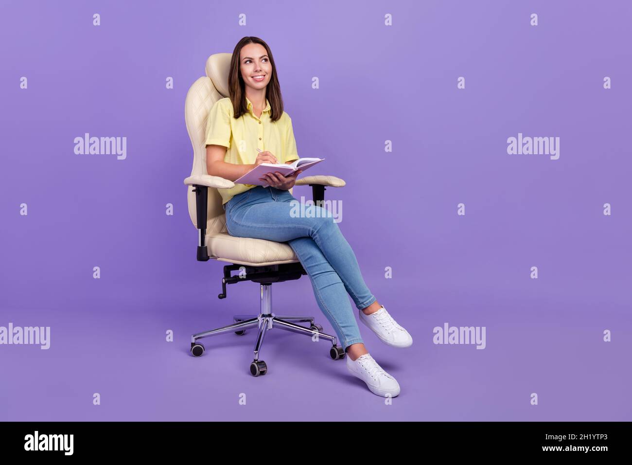 Full body photo of nice young brunette lady write diary look up sit on ...