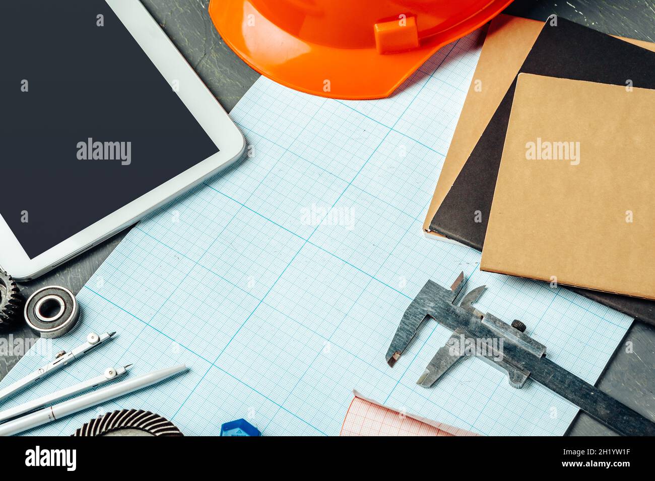 Car engineering tools top view on graph paper Stock Photo - Alamy