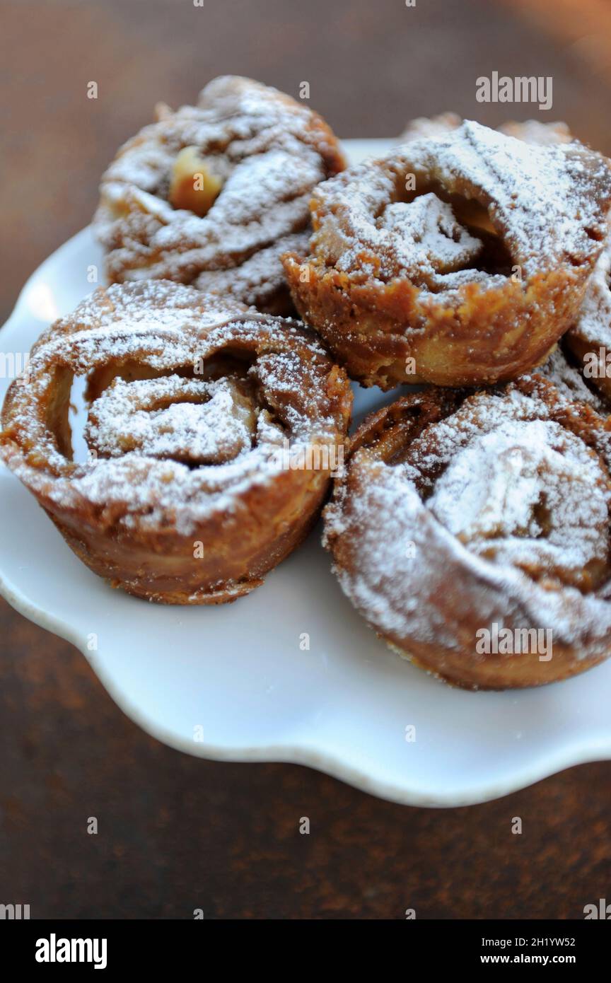 Caramel buns with powdered sugar Stock Photo - Alamy