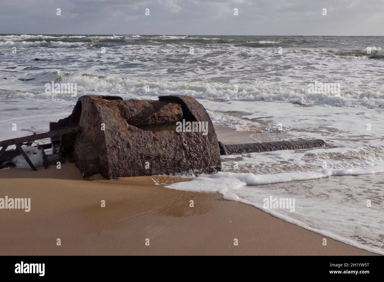 Rusty hull of a sunken ship on a beach,Punta Colorada,Punta del este ...