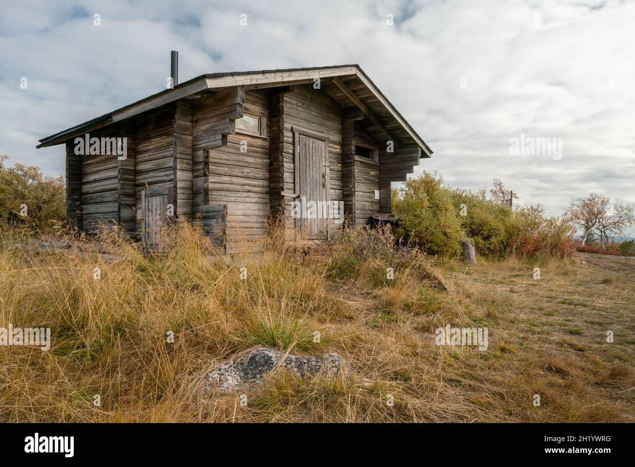 Traditional wooden cabin in Finnish Lapland. One of the huts in Pallas ...