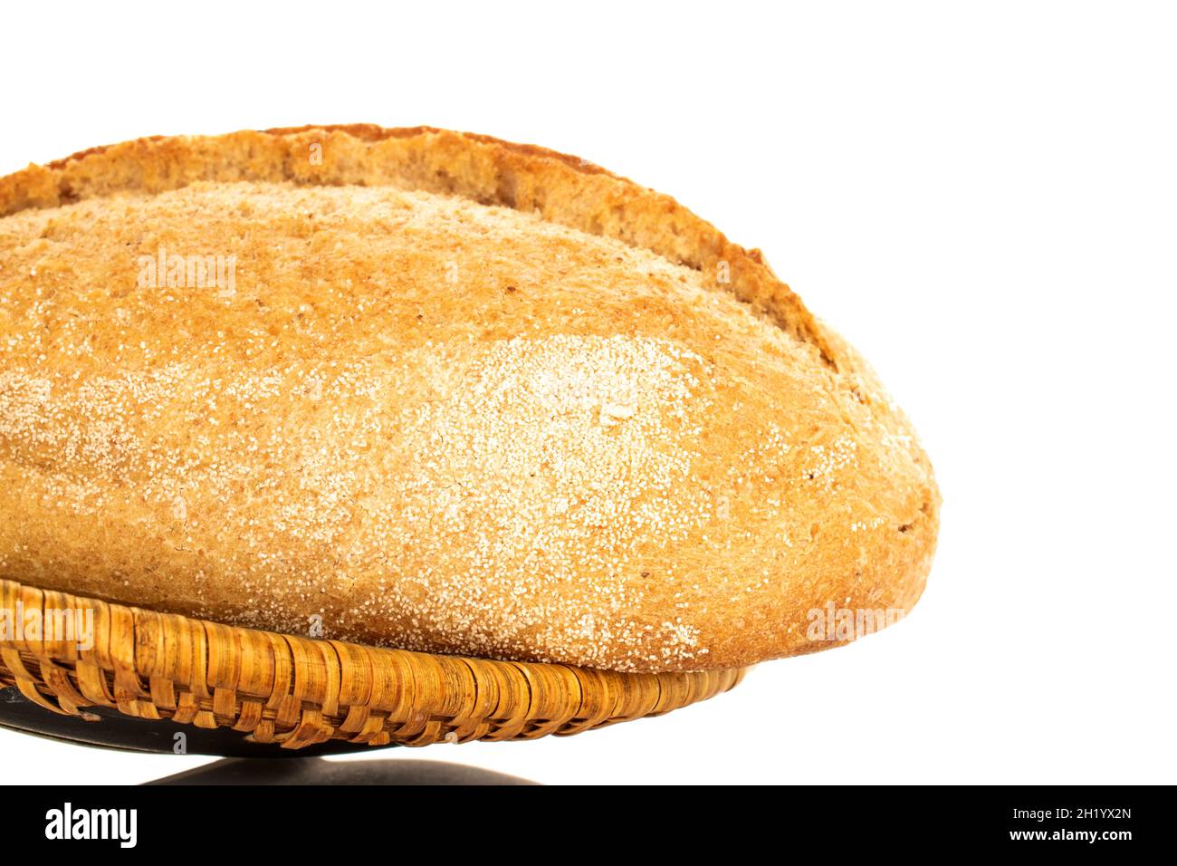 One loaf without yeast with bran flakes, close-up, isolated on white ...