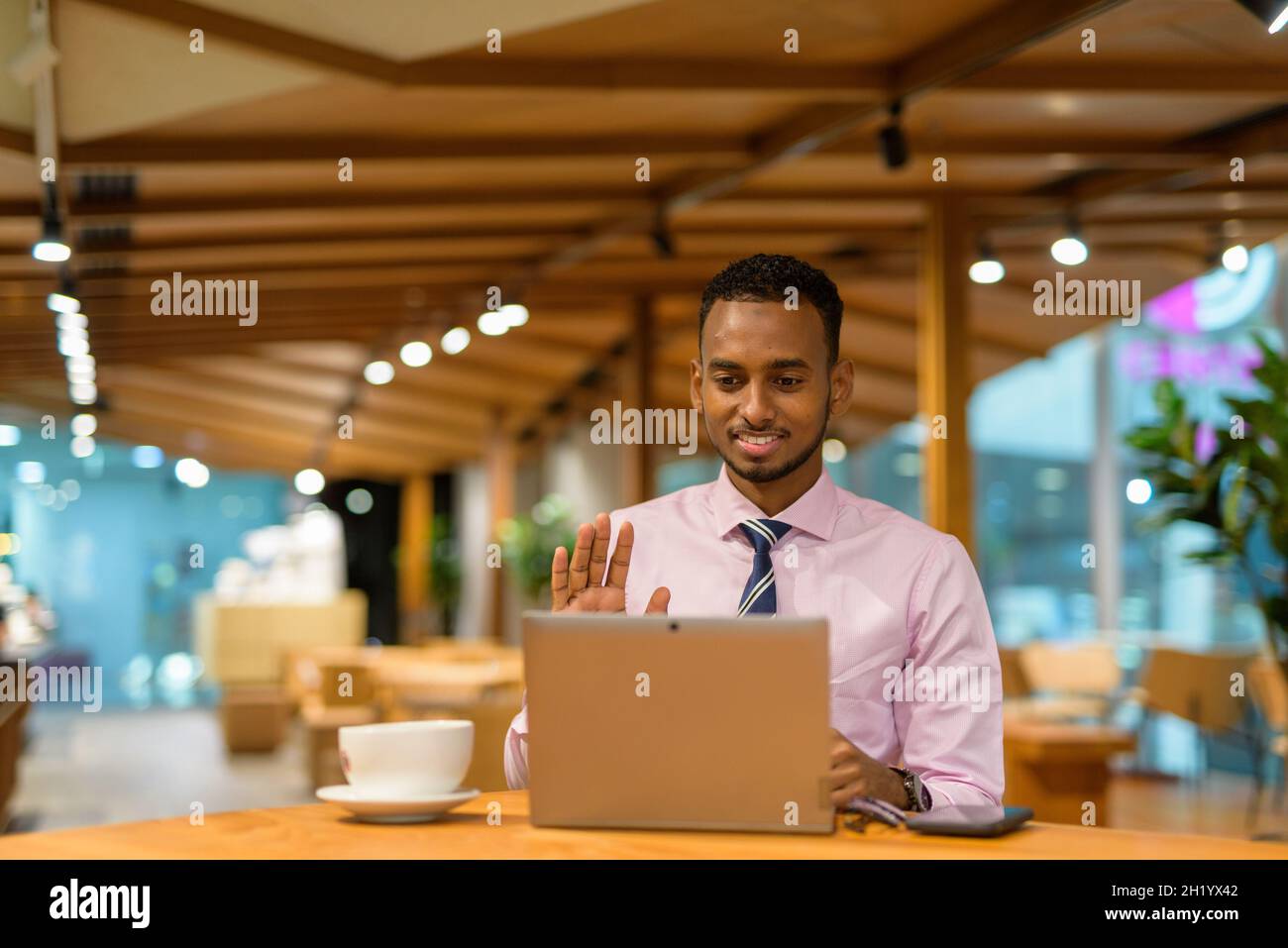 Professional black man working hi-res stock photography and images - Alamy