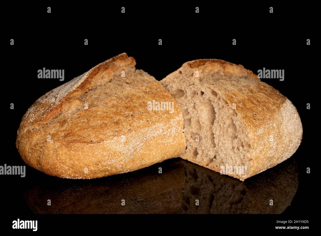 Two halves of a delicious loaf without yeast with bran cereal, close-up ...