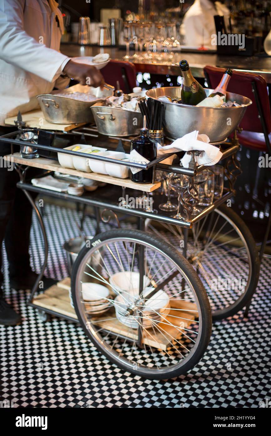 A serving trolley with ingredients for cocktails and drinks Stock Photo ...