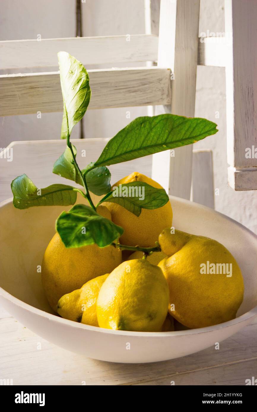 Lemons in white bowl hi-res stock photography and images - Alamy