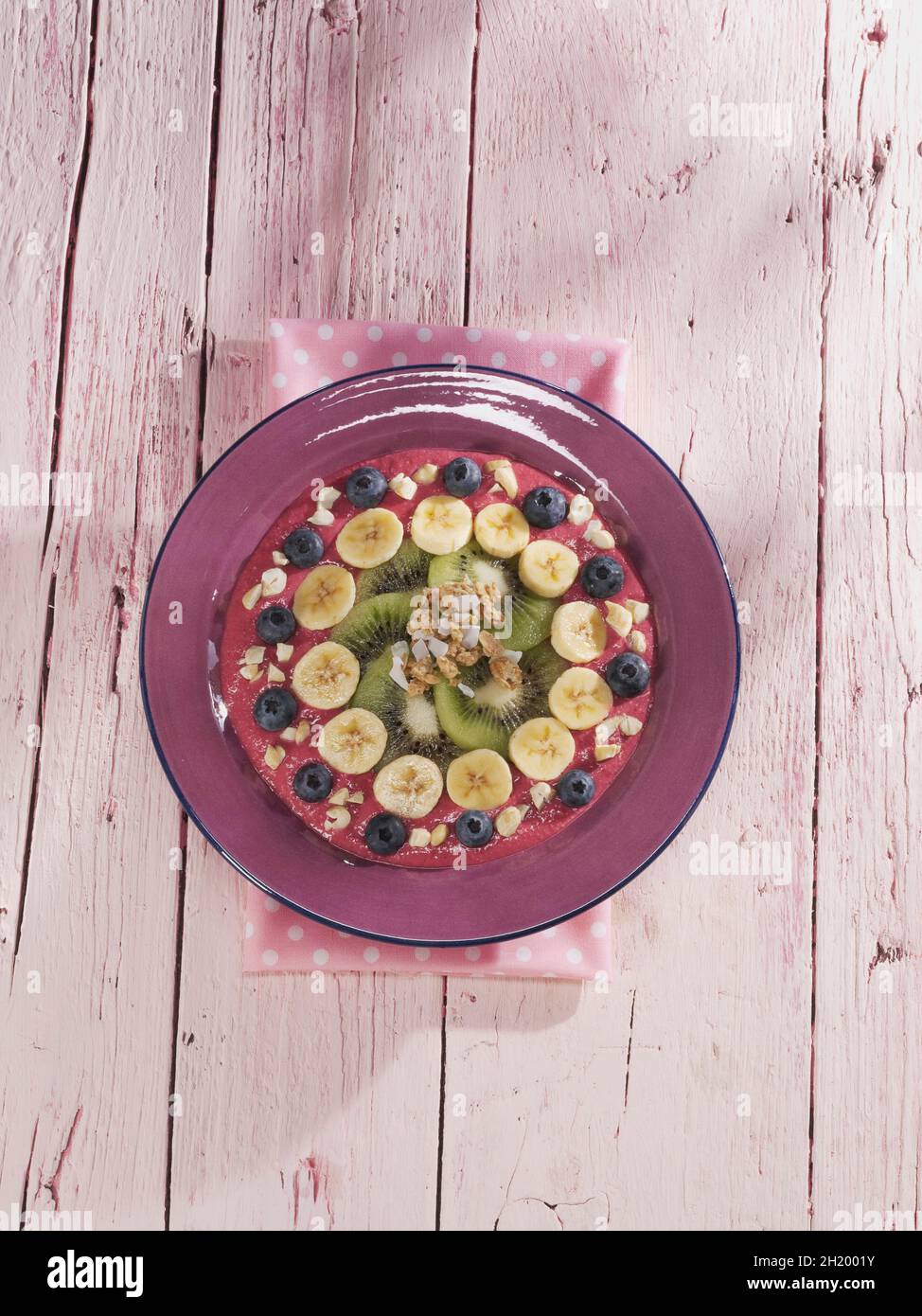 Raspberry, dragon fruit and banana smoothie bowl Stock Photo - Alamy