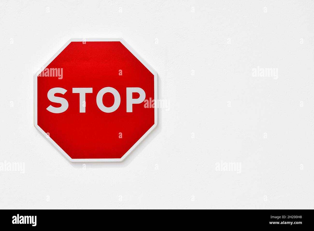 Octagonal traffic sign - STOP- On white background Stock Photo - Alamy