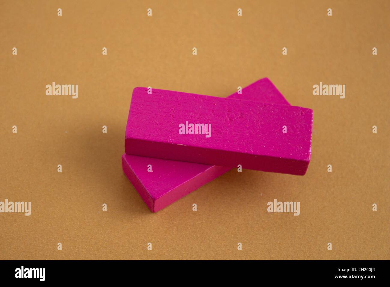 Pink wooden blocks, top view of pink wooden blocks isolated on caramel ...