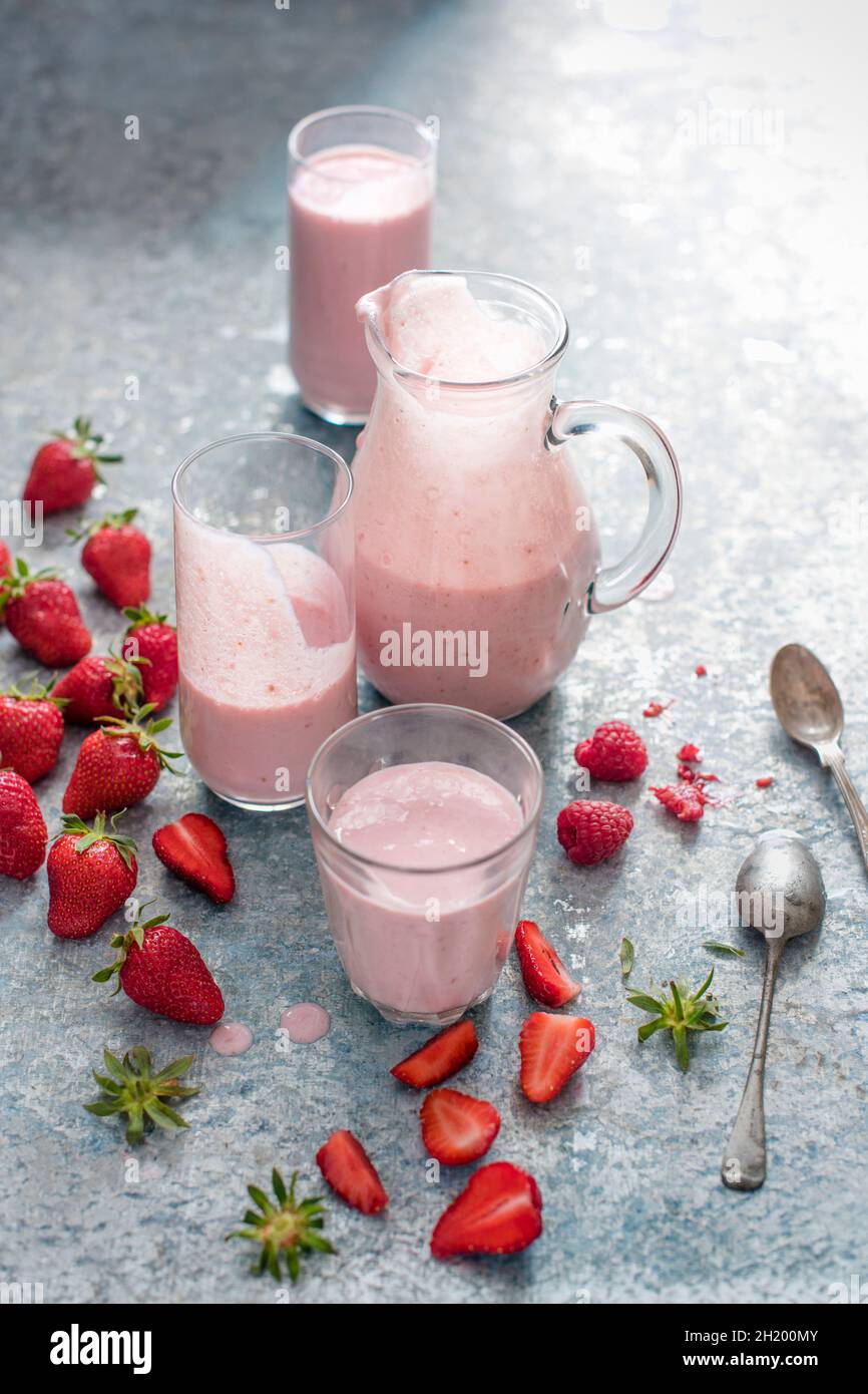 Strawberry and raspbery drinking yoghurt Stock Photo - Alamy