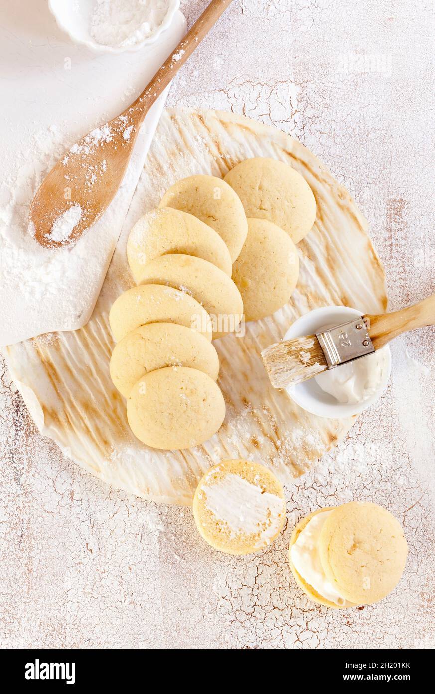 Light whoopie pies with baking ingredients Stock Photo - Alamy