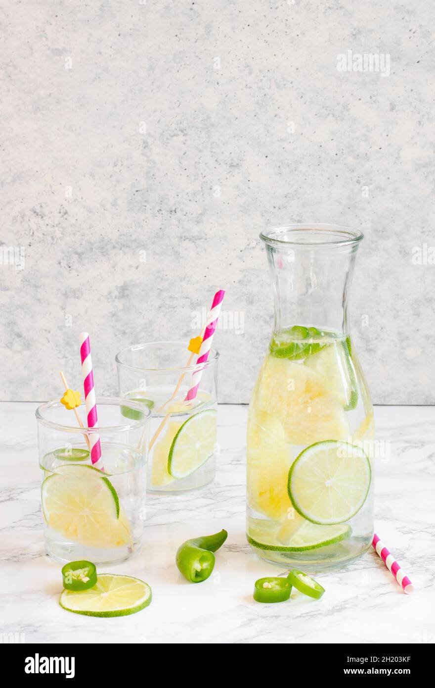 Summer lime lemonade with chilli in a karafe and glasses Stock Photo ...