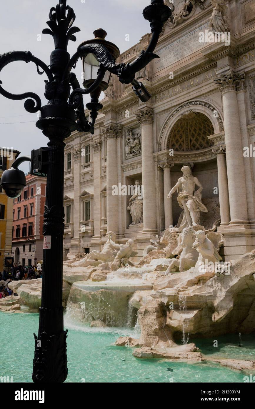 "Three Streets Fountain" or the Trevi Fountain in Italy stand at the ...