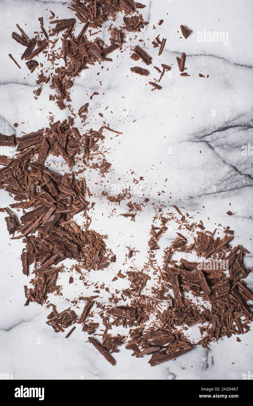Grated dark chocolate on a marble surface Stock Photo - Alamy