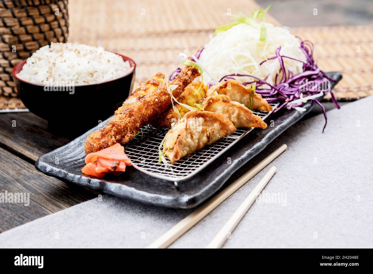 Gyoza and Prawn Katsu platter served with rice (Japan Stock Photo - Alamy