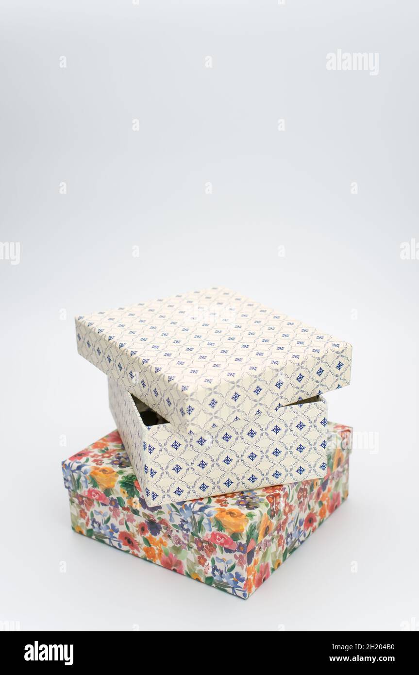 decorated paperboard boxes with lid on top on a white background Stock ...