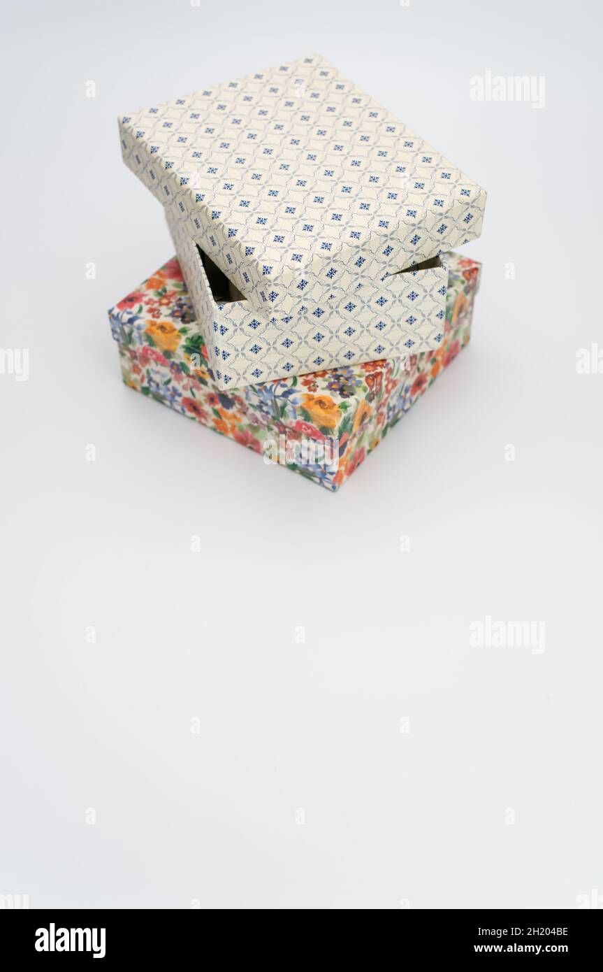 decorated paperboard boxes with lid on top on a white background Stock ...