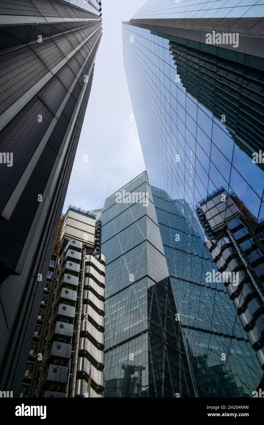 Looking up at the skyward office blocks of Willis Towers Watson, Lloyd ...