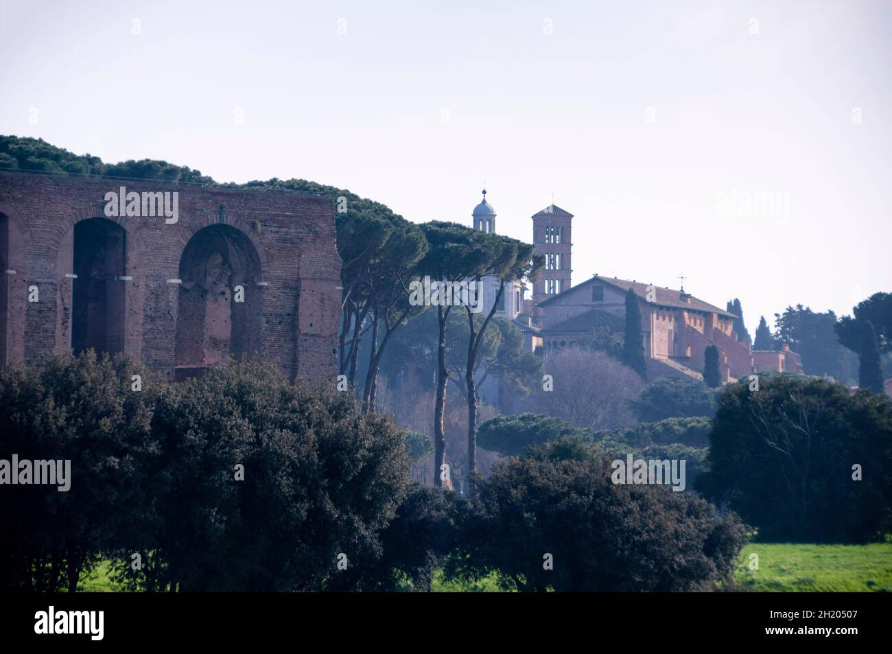 Circus Maximus ruins in Rome, Italian church campanile or bell tower ...