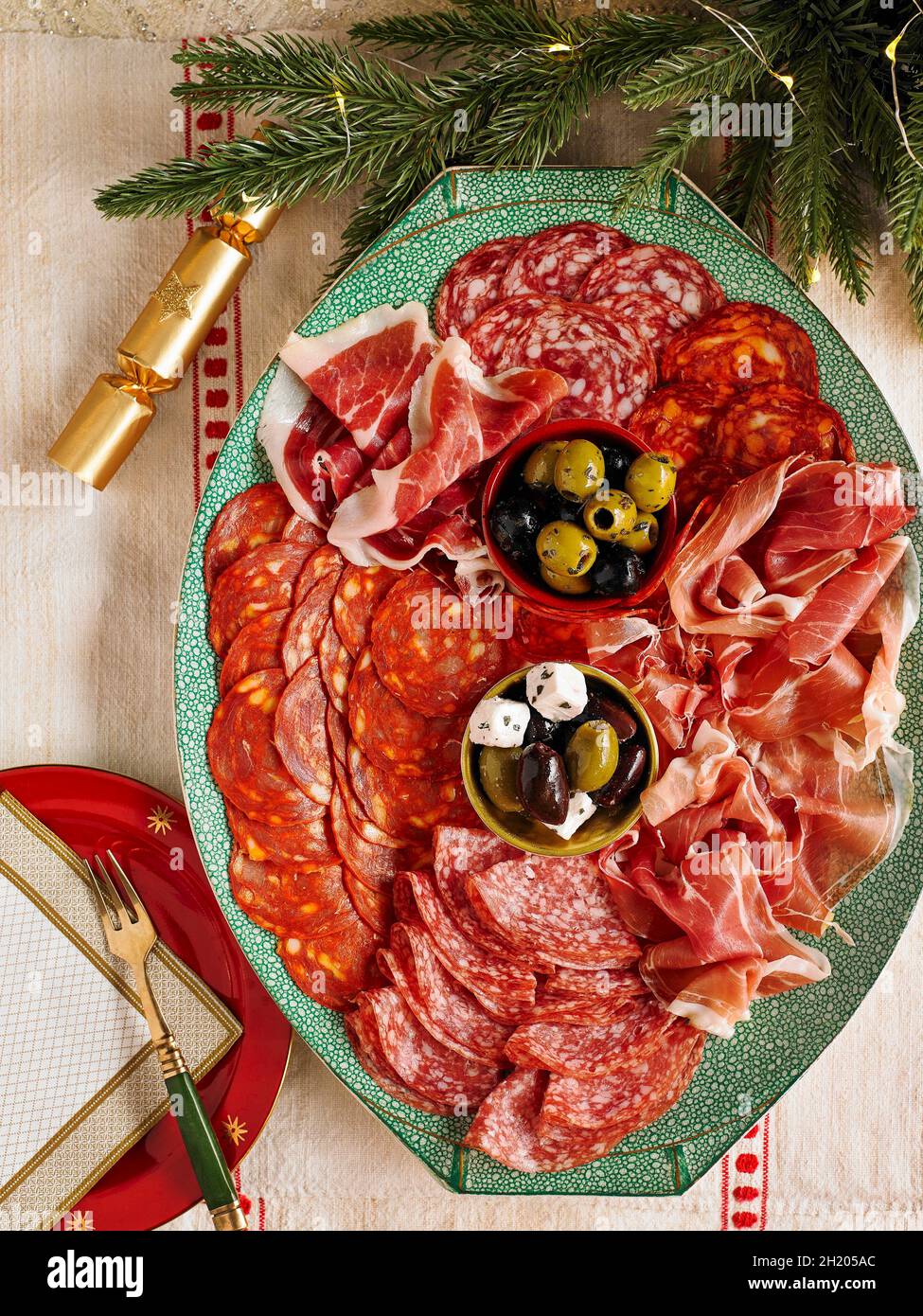 Continental Christmas meat platter with salami, raw ham, olives and ...