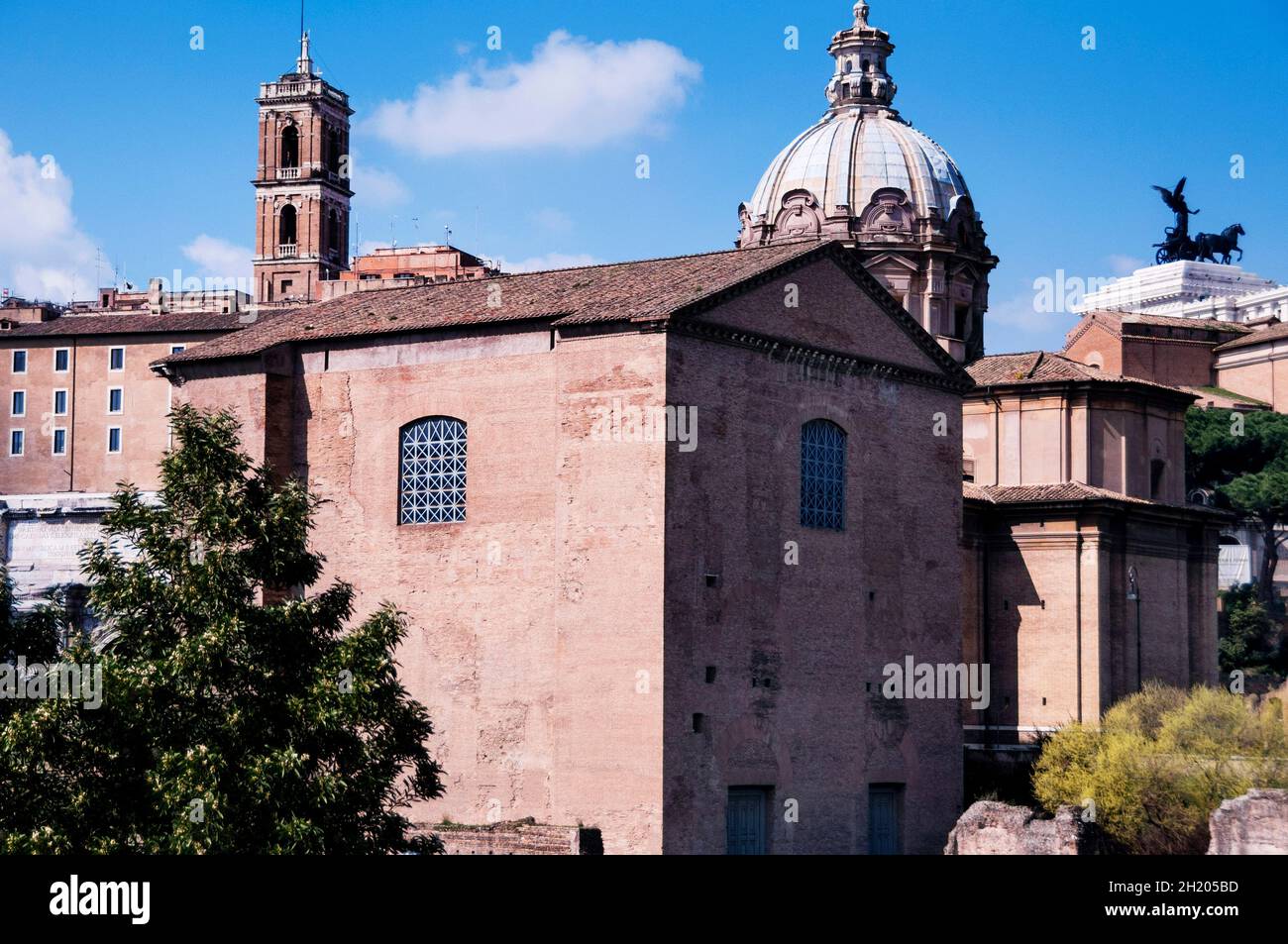Baroque dome of Church of Santi Luca e Martina and Curia Julia ancient ...
