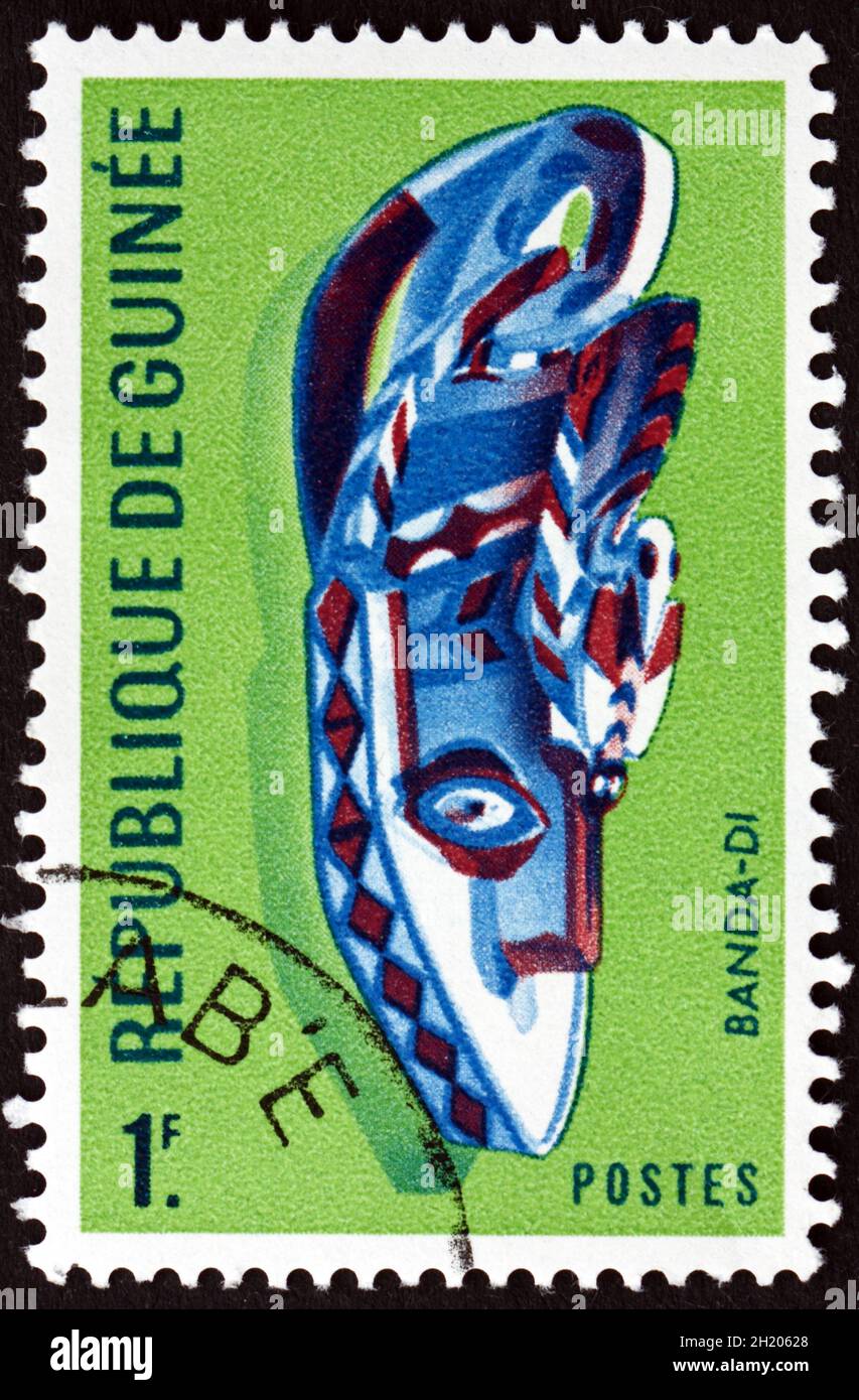 GUINEA - CIRCA 1967: a stamp printed in Guinea shows Small Banda Mask ...