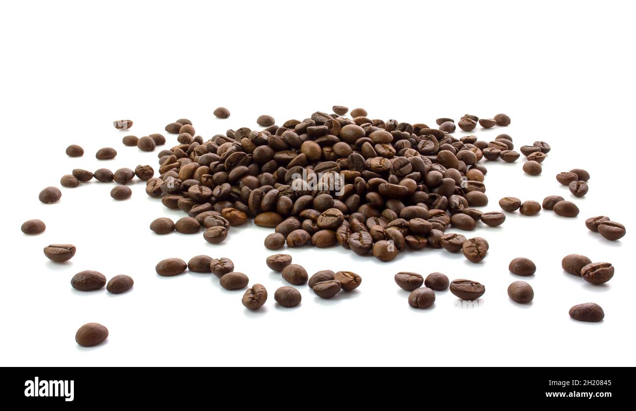 Scattered coffee beans isolated on white background Stock Photo - Alamy