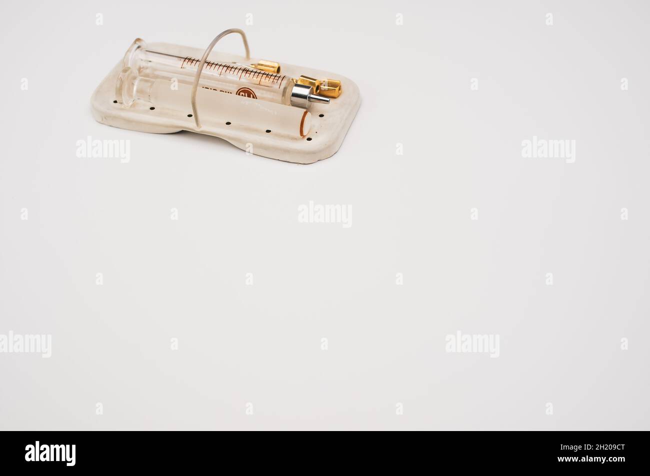 sterilized glass injection syringe in a box on a white surface Stock ...