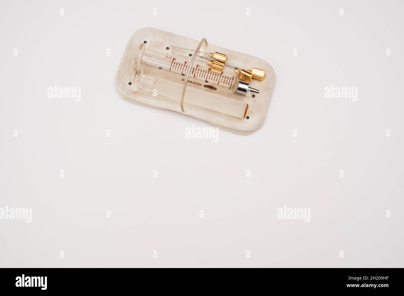 sterilized glass injection syringe in a box on a white surface Stock ...