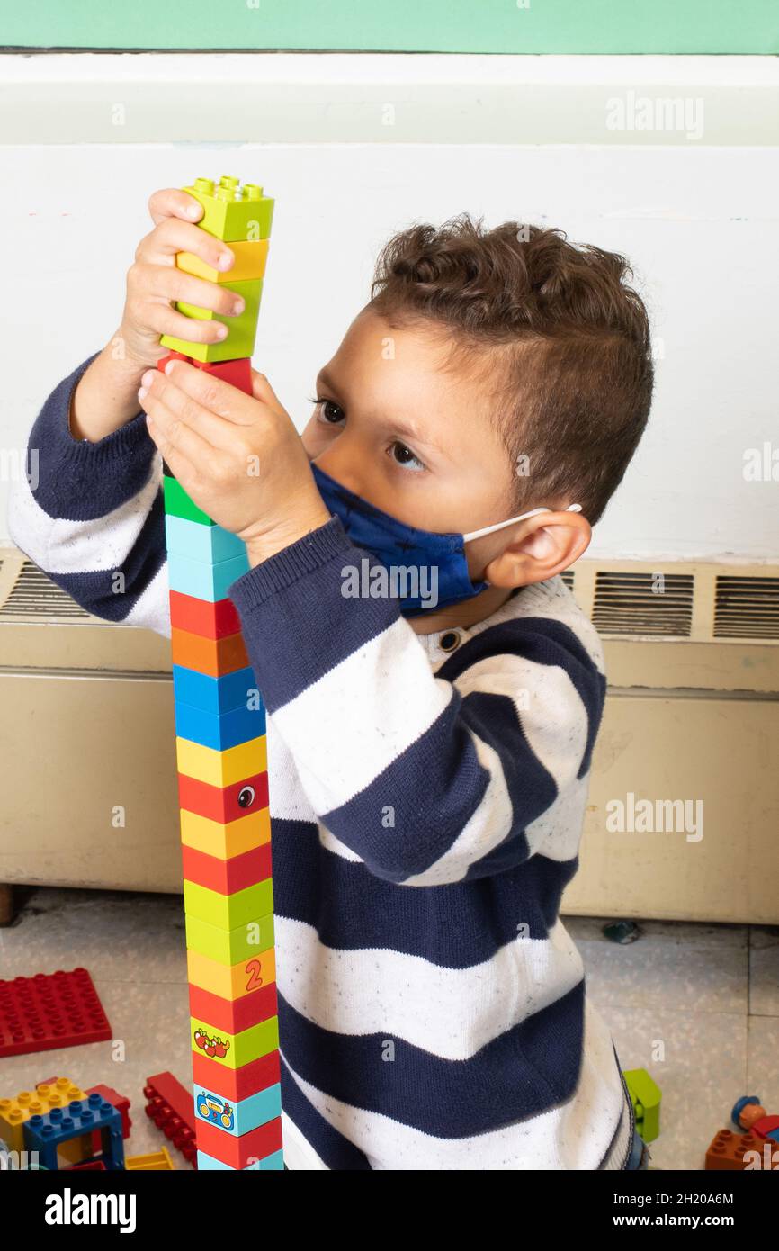 Boy stacking blocks school hi-res stock photography and images - Alamy