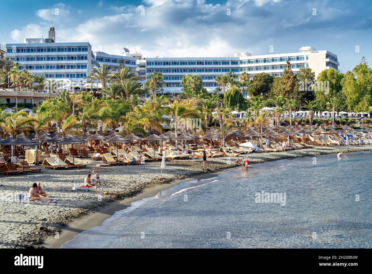 Limassol, Cyprus - June 24, 2018: People sunbathing at the beach with ...