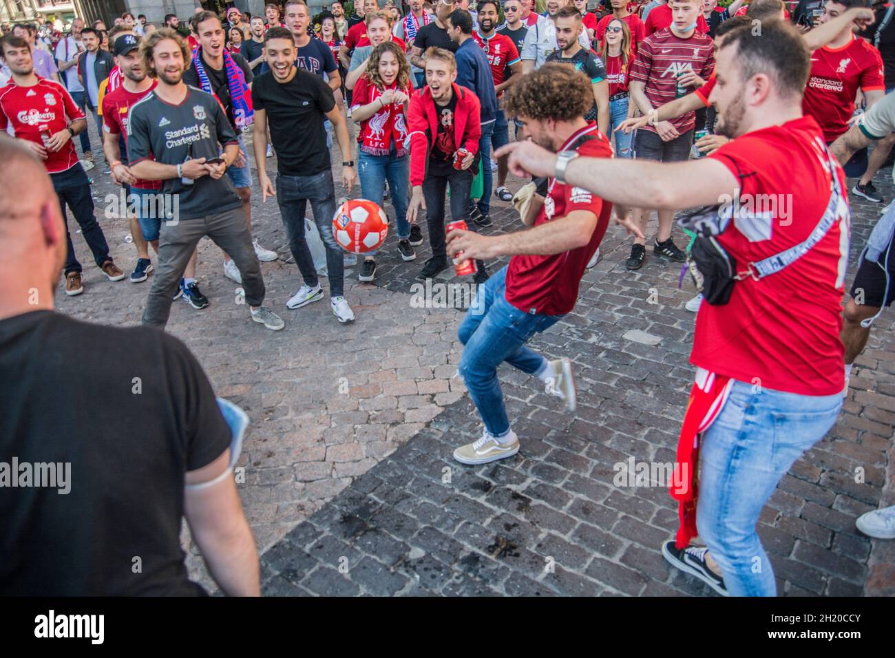 Liverpool fans take part in.a light kickabout in Madrid's famous Plaza ...