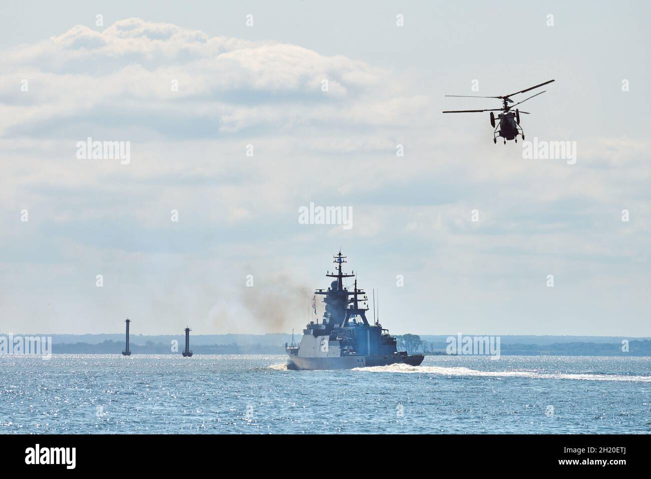 Battleship war ship corvette during naval exercises and helicopter ...