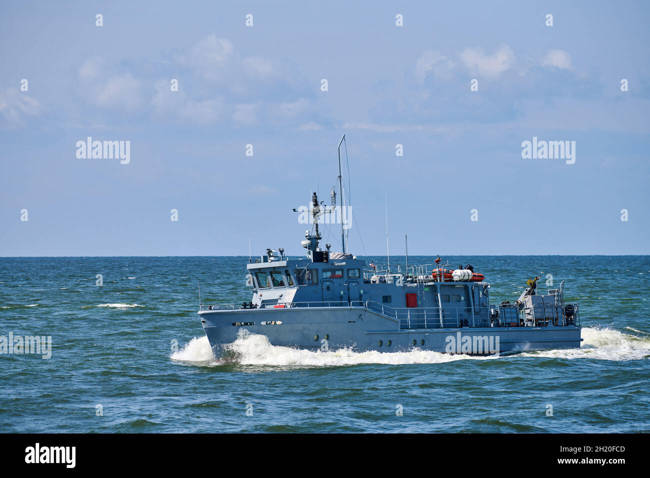 Coastguard, rescue and support patrol boat for defense sailing in blue ...