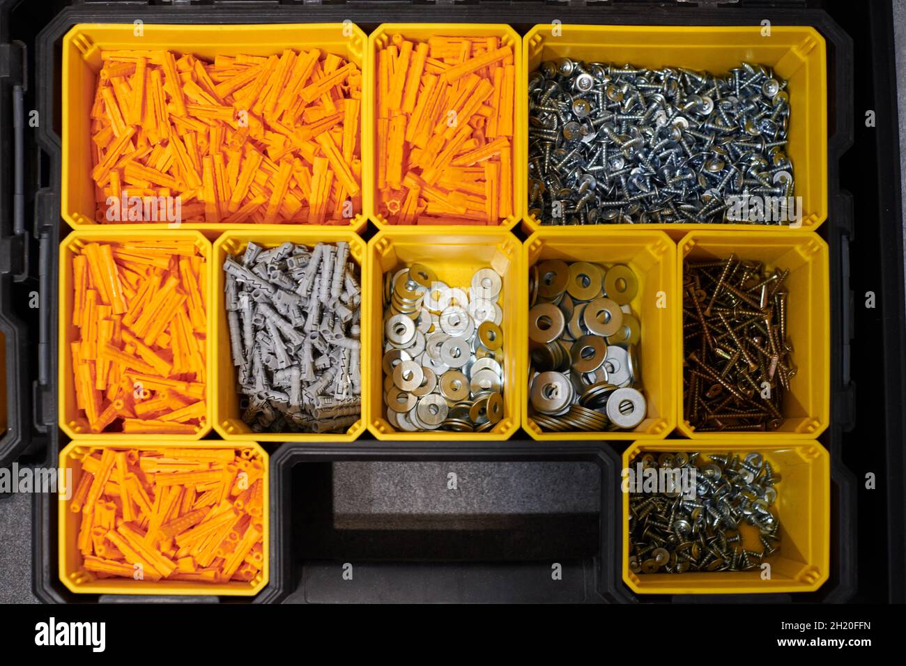 Storage box with small construction objects for repairer, top view ...