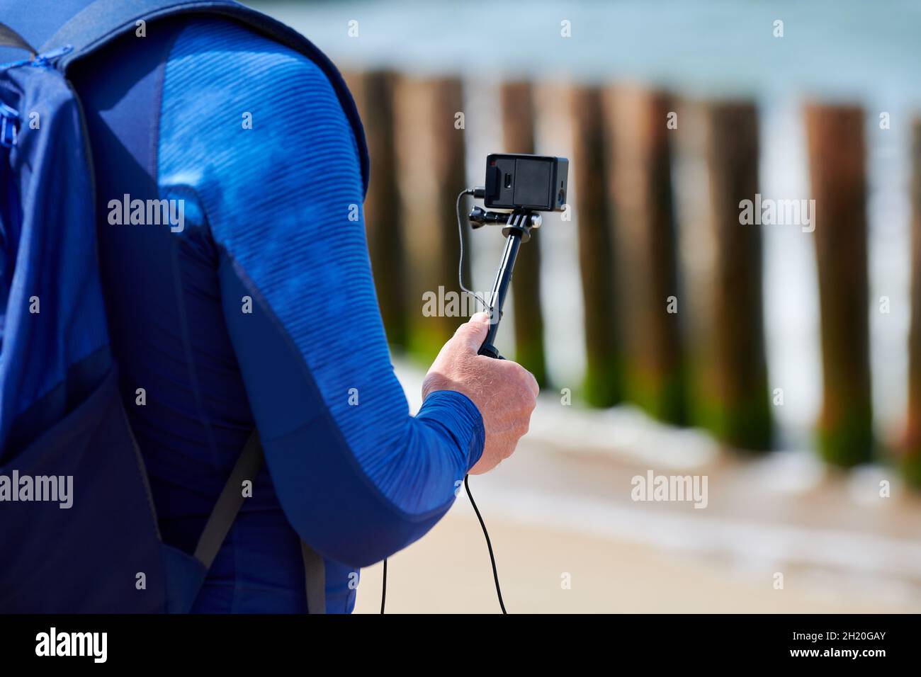 Cameraman filming pole hi-res stock photography and images - Alamy