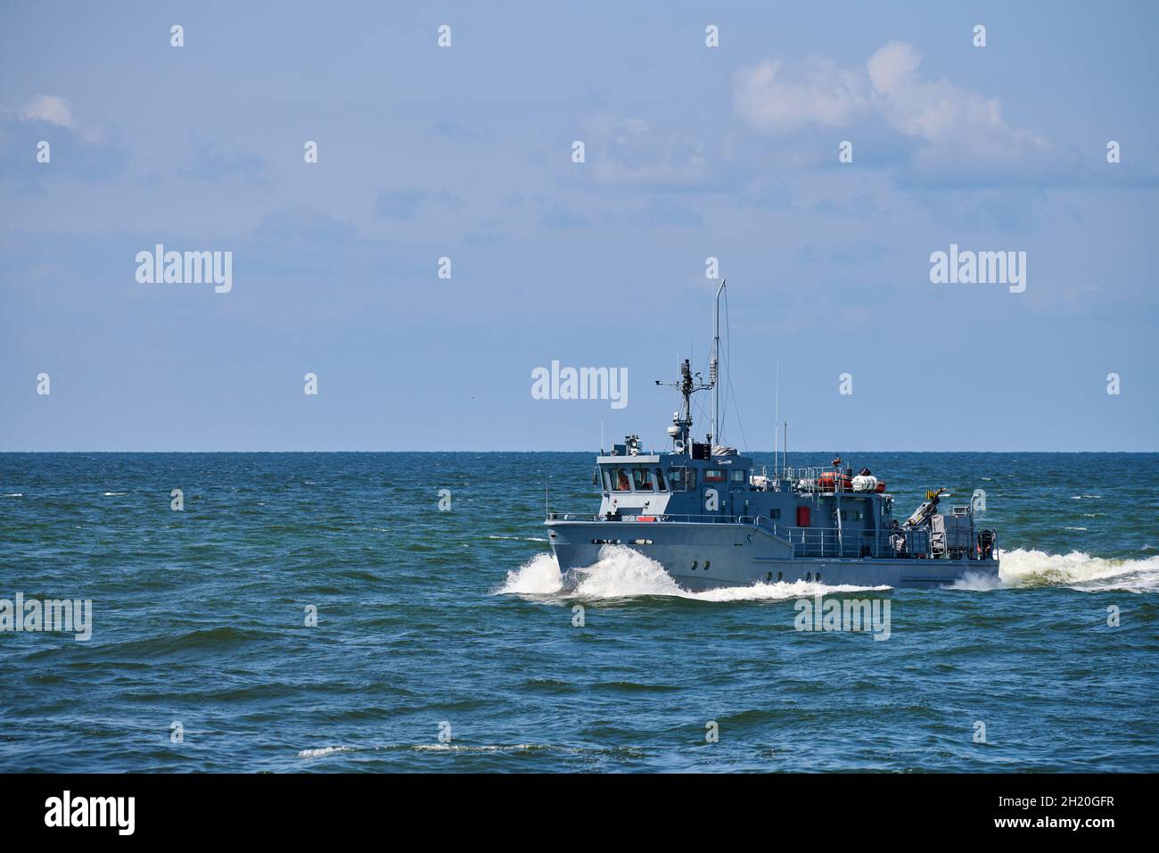 Coastguard, rescue and support patrol boat for defense sailing in blue ...