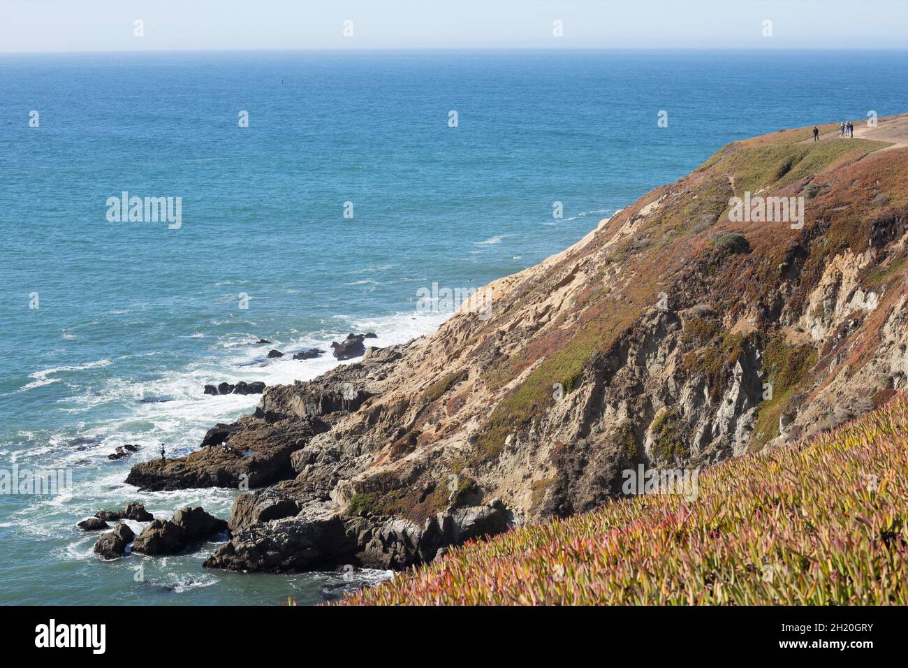 People walking on a cliffside trail at Bodega Head in California Stock ...