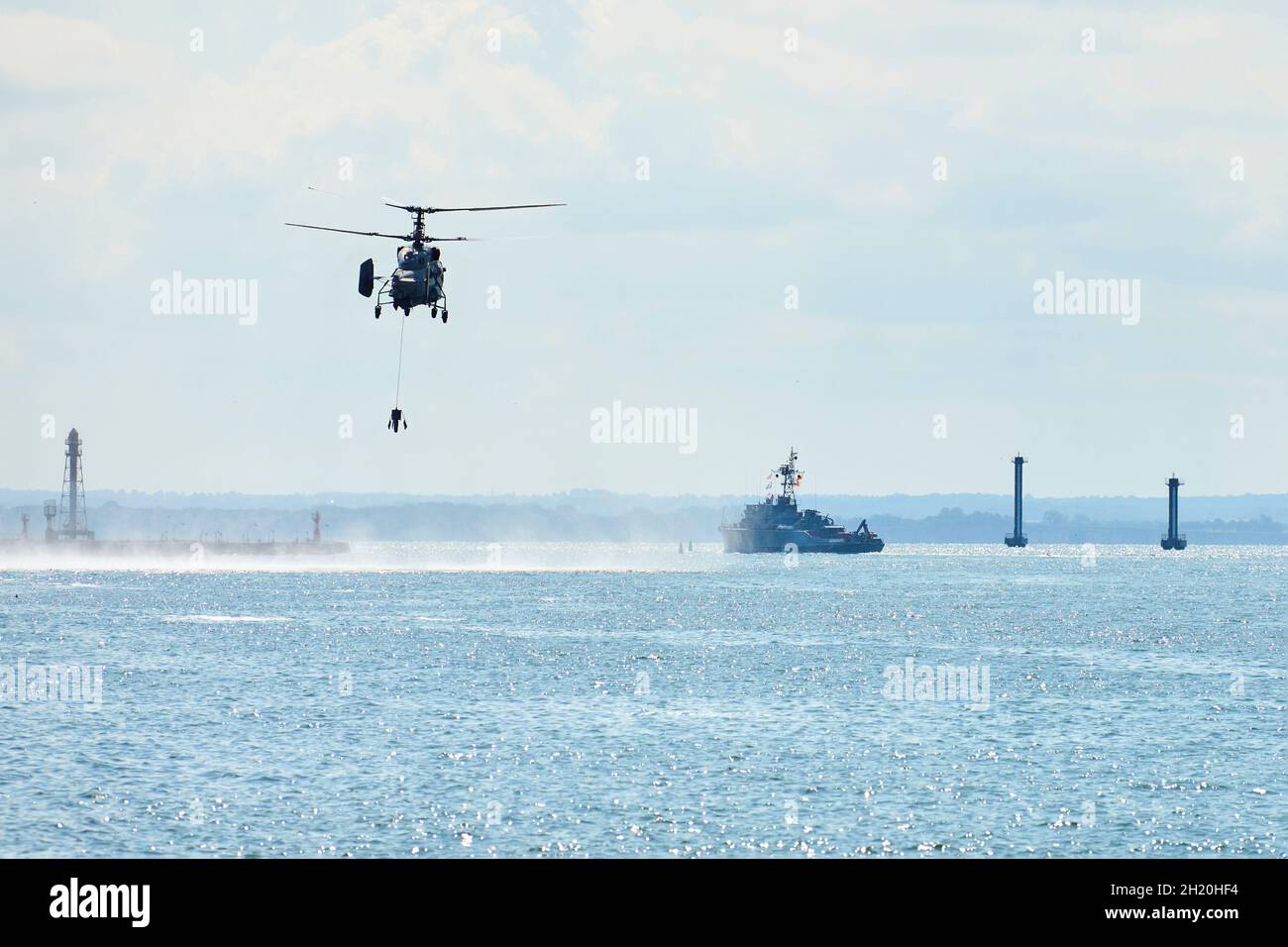 Battleship war ship corvette during naval exercises and helicopter ...