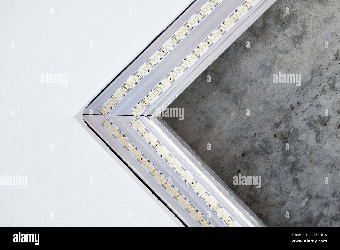 Strip LED light with square aluminum profile. Stretch ceiling with LED ...