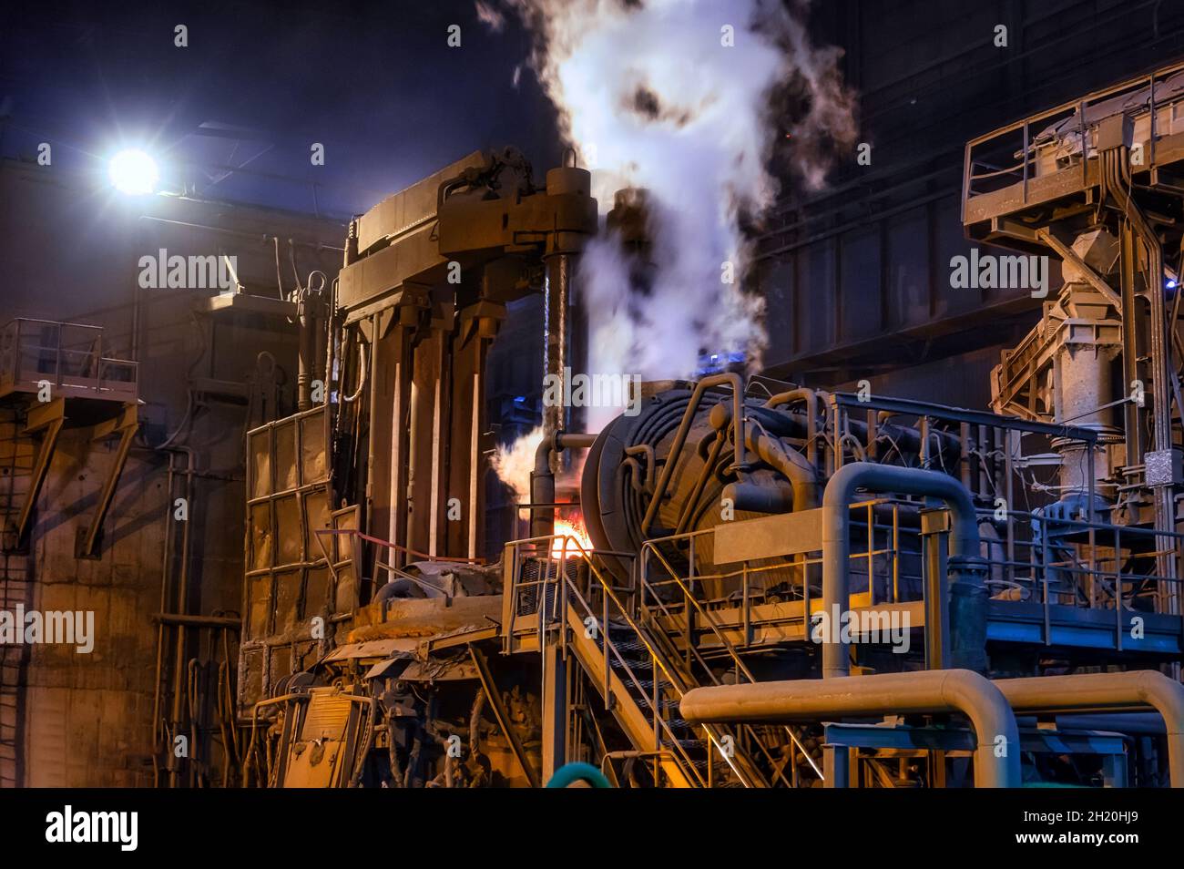 Electric arc steelmaking furnace, thick powerful red-hot graphite ...
