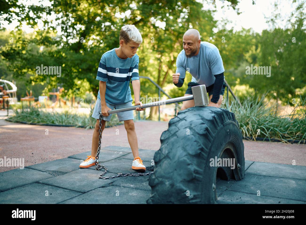 Father and son, crossfit training on playground Stock Photo - Alamy
