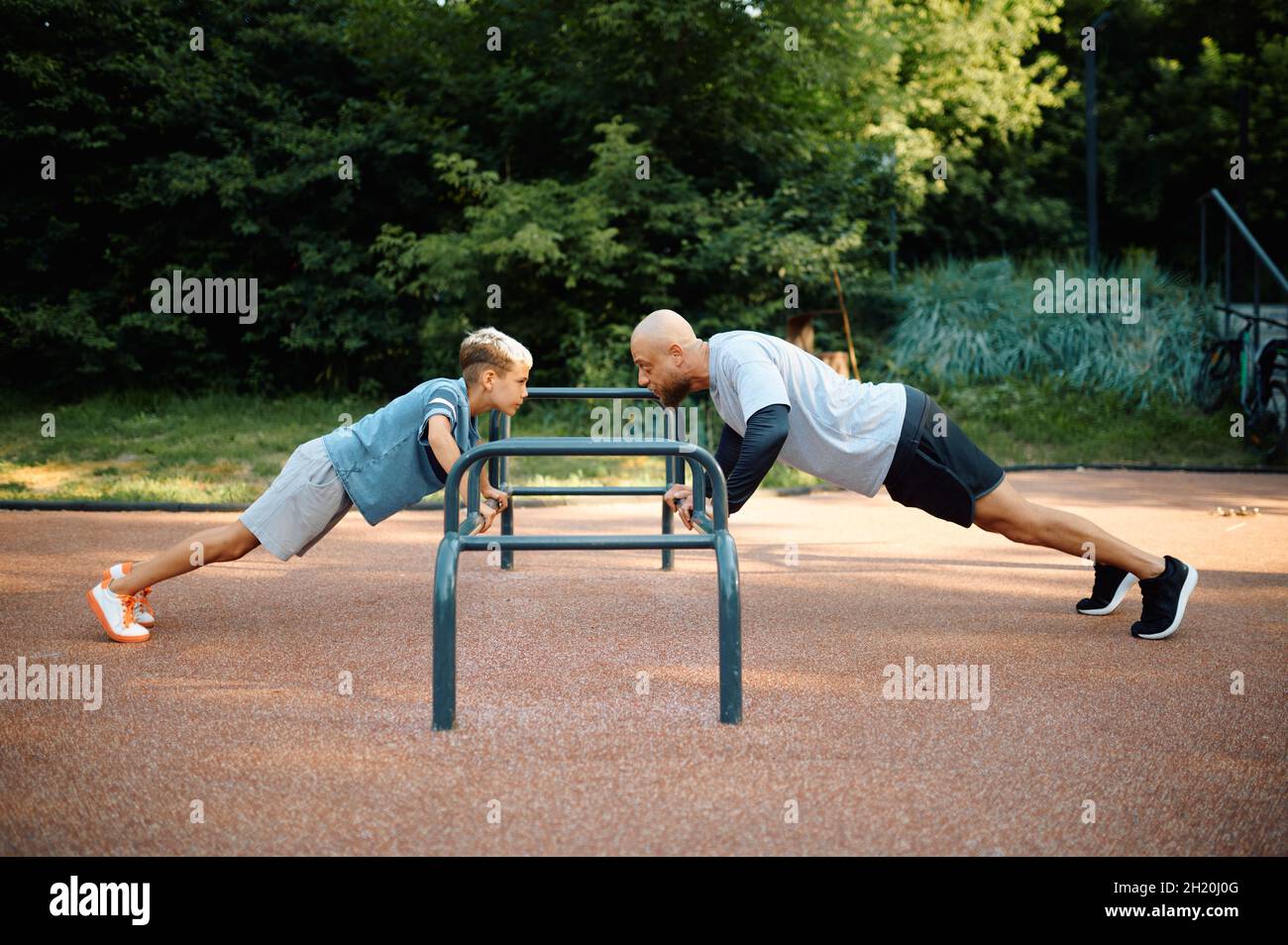 Father son sport push hi-res stock photography and images - Alamy