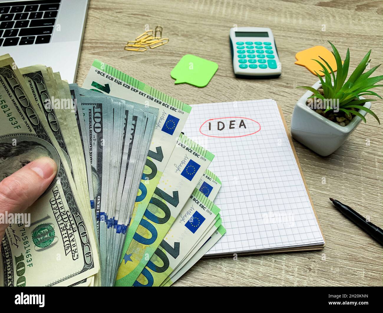 Woman counting dollar bills table hi-res stock photography and images ...